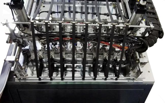 Close-up view of magnetic stripe bonding process