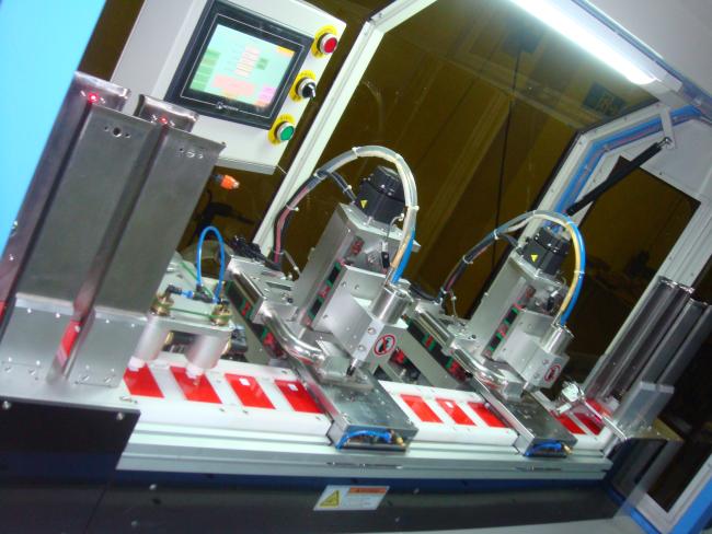 Close-up view of IC card milling process