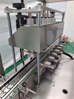 China Automatic Pneumatic Vacuum Bottle Capping Machine with Cap Elevator 220V 25-34pcs/min for sale
