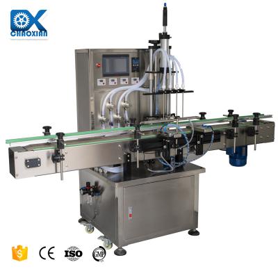 China Pure Apple Litchi Drink Ink Bottle Liquid Dosing Automatic Gravity Quantitative Filling Machine for sale