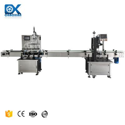 China Pure Apple Litchi Drink Ink Bottle Liquid Dosing Automatic Gravity Quantitative Filling Machine for sale