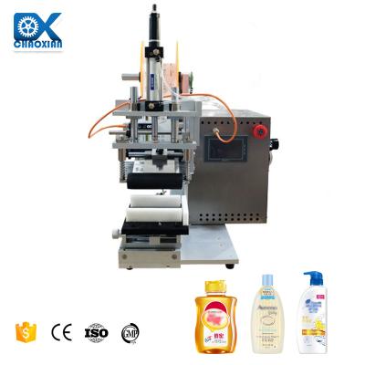 China High Quality Semi Automatic Shower Gel Wine Flat Bottle Surface Sticker Manual Labeling Machine for sale