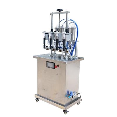 China 4 Head Semi Automatic Lady Spay Fragrance Vacuum Equal Level Perfume Liquid Filling Equipment for sale
