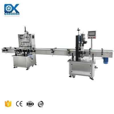 China Multi - Heads Automatic Digital Control Food Drip-Proof Water Essential Oil Filling Machine for sale