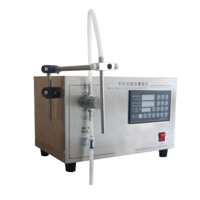 China 100-1000 ml Semi Automatic Watermelon Juice Perfume Filler On Sale Milk Bottle Packing Machine for sale