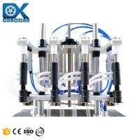 China Automatic Vacuum Equal Level Wine Bottle Filler 100-1000ml Servo Driven for sale