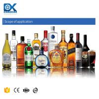 China Automatic Vacuum Equal Level Wine Bottle Filler 100-1000ml Servo Driven for sale