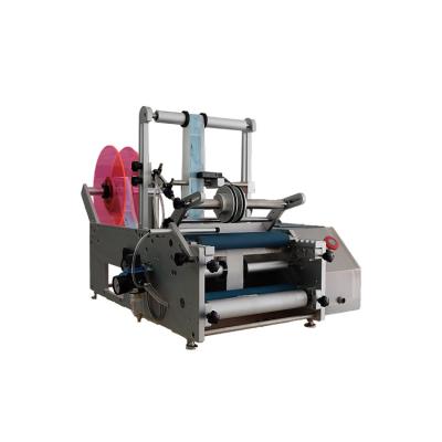 China Nail Polish Jerry Honey Can Self Adhesive Sticker Semi Automatic Round Bottle Labeling Machine for sale