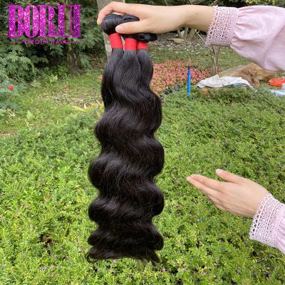 Cina 10A capelli stati allineati cuticola, capelli malesi peruviani umani vergini crudi lisci in vendita