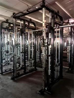 China Equipamento de exercícios de fisiculturismo Cage Squat Rack com cabos multifunção Crossover à venda