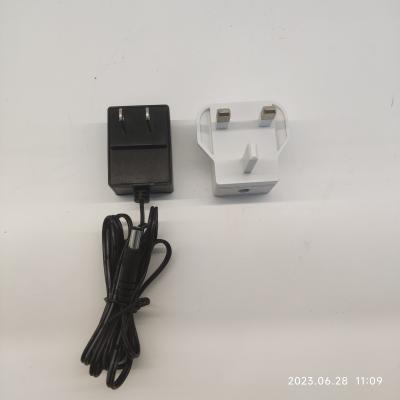 Cina adattatore dell'alimentazione elettrica del supporto della parete di 5W 5V 2A per la fibra ccc del massaggiatore del piede in vendita