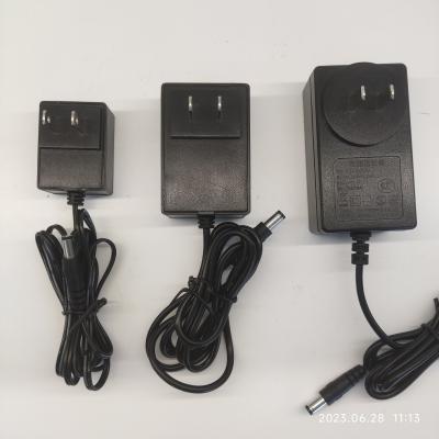 Cina spina/CC Jack del blocchetto terminali/CC degli adattatori di potere del supporto della parete di 1A 12.8V 10W in vendita