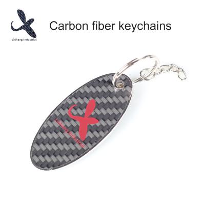 China Oval Real Carbon fiber keychains, for car carbon fiber gift key chains, Accept Customized Order for sale