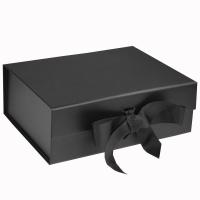 China Rectangle Magnetic Folding Gift Box Rigid Paper Packaging Box With Ribbon for sale