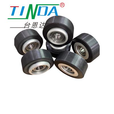 China Roda de rolamento elastomérica de superfície lisa para soluções de transporte de materiais industriais personalizadas à venda
