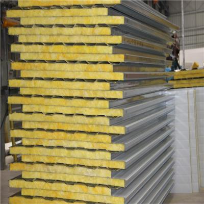 China lowes metal roofing cost insulated 960mm glass wool sandwich roof panel for roof for sale