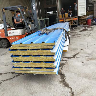 China 11800mm rock wool sandwich roof panel 960-50-0.376mm with embossing steel sheet dpwn for sale