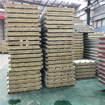 China 960mm rock wool sandwich panels roof sheet with waterproof cap for prefab buildings for sale