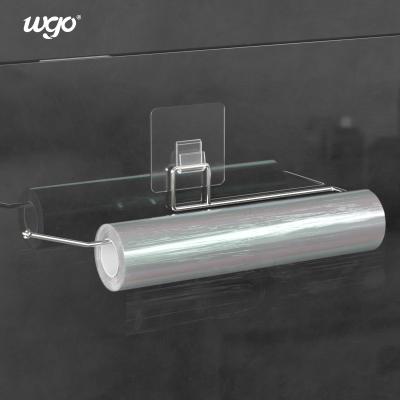 Cina Supporto d'attaccatura di plastica del rotolo del tessuto di toilette dell'erogatore del supporto della parete autoadesivo in vendita
