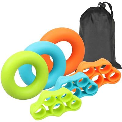 Cina Strencher mani in silicone Esercitore per le dita Strencher manico Strencher forza NUOVO MATERIALE Strencher manico allenamento in vendita