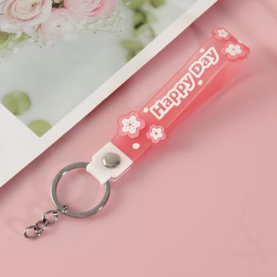 China Personalized Luminescent Silicone Pendant Keychain Wrist Keychain Bracelets For Keys Or Wallets for sale