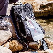 Canteen attached to backpack
