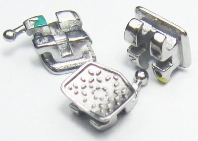 Cina Strumenti ortodontici dentari di MIM One Pieces Metal Brackets con la base di Serated in vendita
