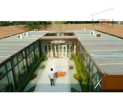 China Low cost flat pack container house for sale