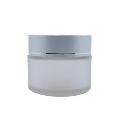 China Guangzhou Factory 50g Frosted Cosmetic Packaging Glass Cream Jar with Lid for sale