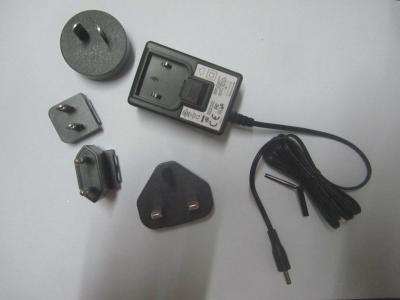 China External wall mount power supply with interchangeable plug adapters, 12Vdc, 500mA to 1A for sale