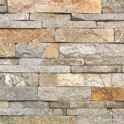 Cina Pietra rossa economica di pietra naturale del bordo del granito della Cina, rivestimento impilato DE-34 della parete in vendita
