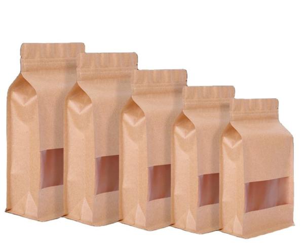 Quality Vertical zipper brown kraft paper resealable zipper heat-sealable food packaging bag transparent window for sale