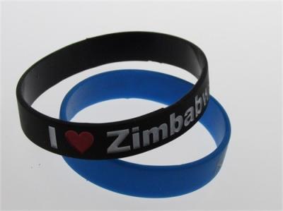 China black two colors filled custom silicone wristband debossed and painted bracelet en venta