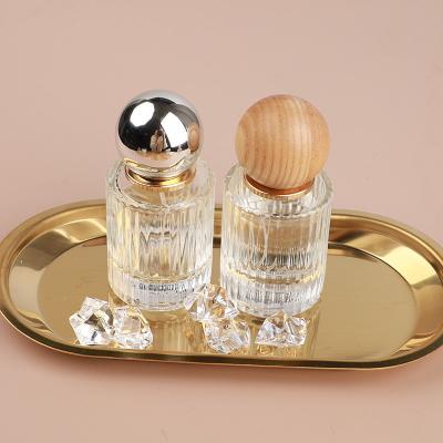 中国 携帯用香水スプレーは30ml 50MLガラスの空のクルミをびん詰めにしました 販売のため