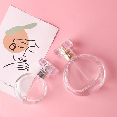 Cina OEM 50ml 20 ml di profumo dello spruzzo della bottiglia di profumo di vetro rotondo piano portatile della bottiglia in vendita