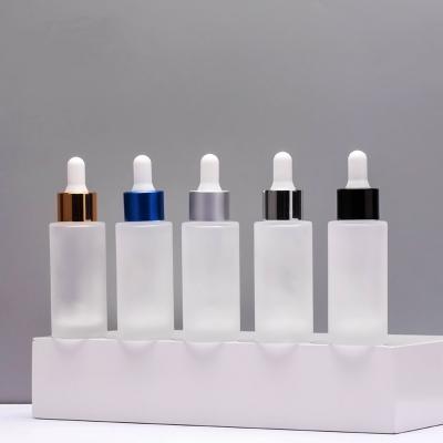 Cina Il contagoccia di vetro 1oz dell'olio essenziale 30ml imbottiglia la stampa dello schermo in vendita
