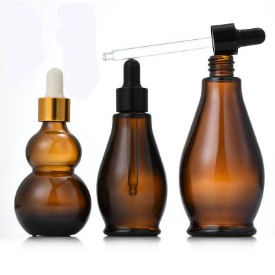 Cina La zucca del contagoccia 10ml modella la stampa di seta di Amber Glass Roll On Bottles in vendita