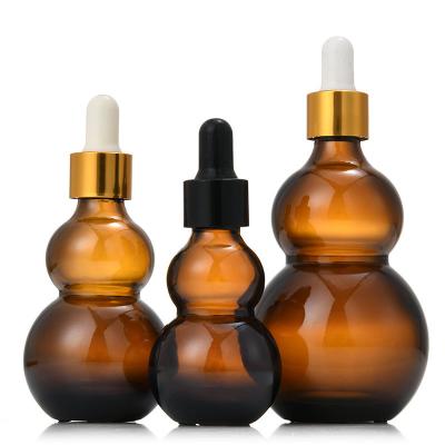 Cina La zucca del contagoccia 10ml modella la stampa di seta di Amber Glass Roll On Bottles in vendita