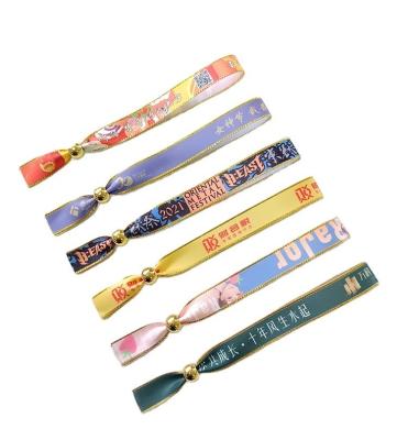 Cina Logo personalizzato Braccialetti RFID Tessuto satinato per eventi e festival Utenti finali target in vendita