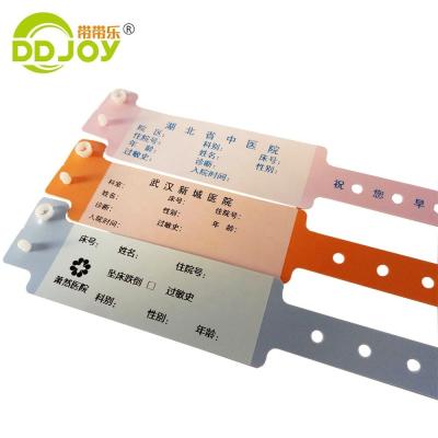 Cina Braccialetto usa e getta di plastica medica arancione per sistema di identificazione ospedaliero personalizzato in vendita