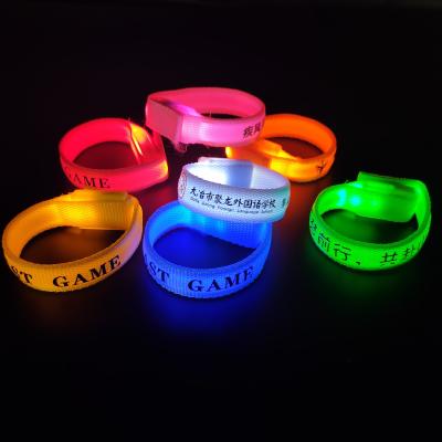 China Custom Silk Screen Offset Printing Nylon LED Wristband for Night Running Glow in Dark Armband for sale