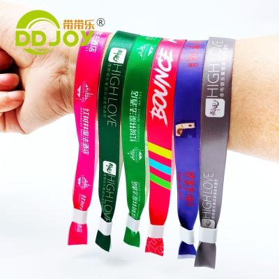 Cina Braccialetti di stoffa tessile ricamati Ideali per eventi Festival Parchi Feste e club in vendita