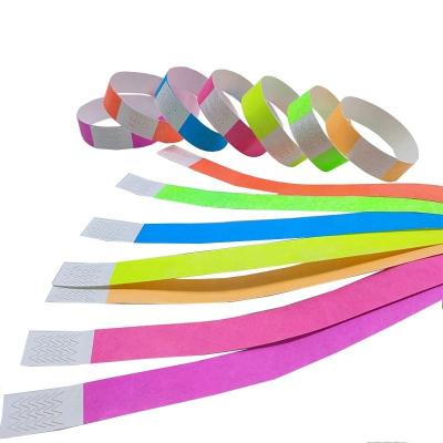 China Make a Statement at Festivals with Our Neon Paper Tyvek Wristband in Various Colors for sale