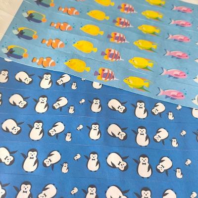 Cina Braccialetti di carta Tyvek per disegni personalizzati Stock di dinosauri Conigli Palloni e altro in vendita