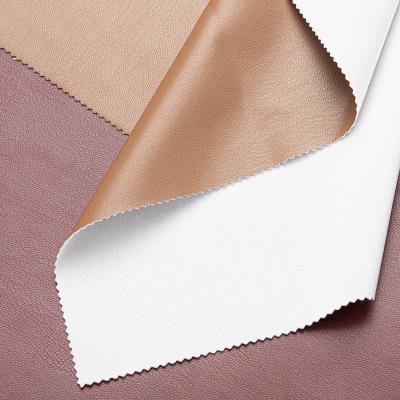 China Smooth Garment PU Leather Knitted Four Sided Elastic Faux Leather for sale