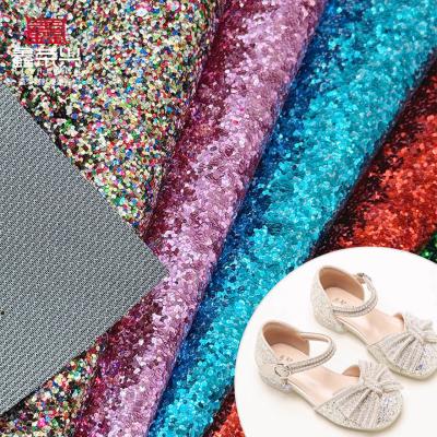 China Coarse Glitter PVC Synthetic Leather for Shoe Jewelry Craft Luggage Bag Packaging Boxes Faux Leather Material for sale