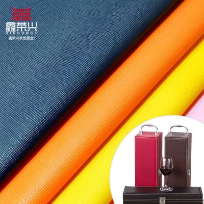 China PVC Cross Grain Artificial Synthetic Leather for Wallet Packaging Case Shoes Notebook Leather Fabric for sale