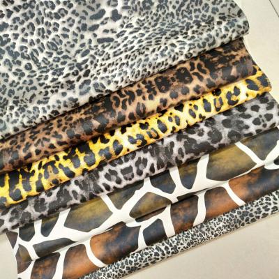 China Wholesale Pvc Leopard Printed Synthetic Artificial Leather for Bag Notebook Phone Shell Table Mat Faux Leather Fabric for sale