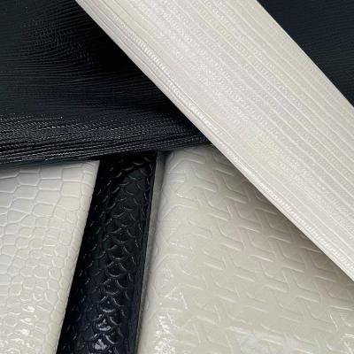 Cina Custodia per telefono in pelle sintetica PVC, artigianato per mobili, stile goffrato lucido e scintillante con funzione elasticizzata, fodera impermeabile per divano in vendita