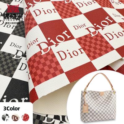 중국 인쇄 된 PVC 가짜 가죽 직물 0.8mm 두께 가방 및 지갑 판매용